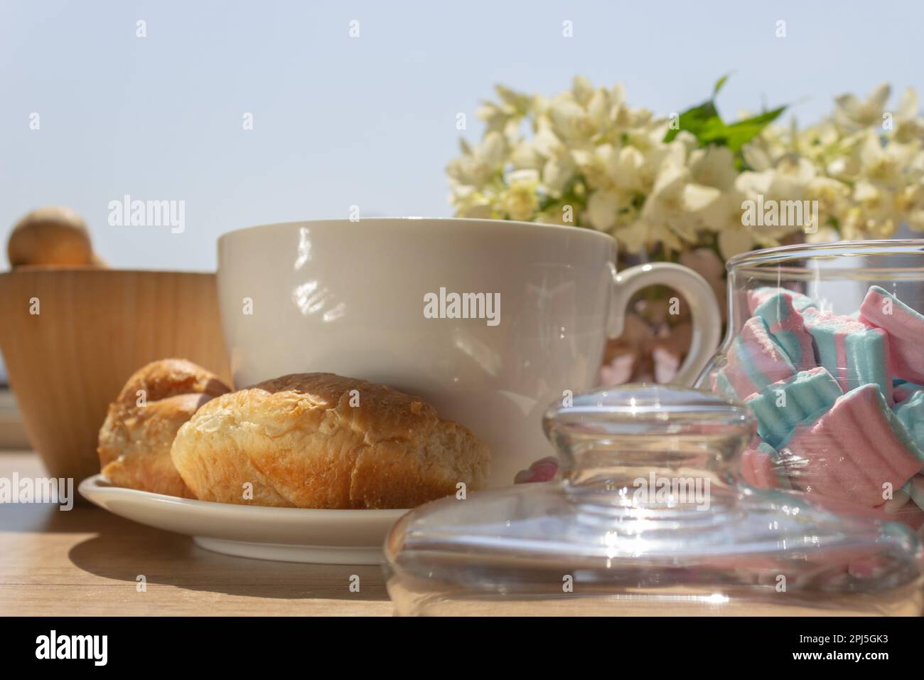 Tea drinking at an open window in sunny weather Stock Photo - Alamy