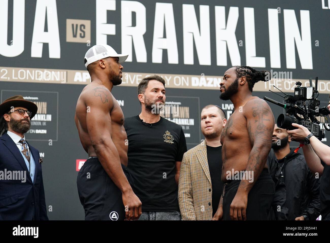 Anthony Joshua (left) and Jermaine Franklin face-off during the weigh ...