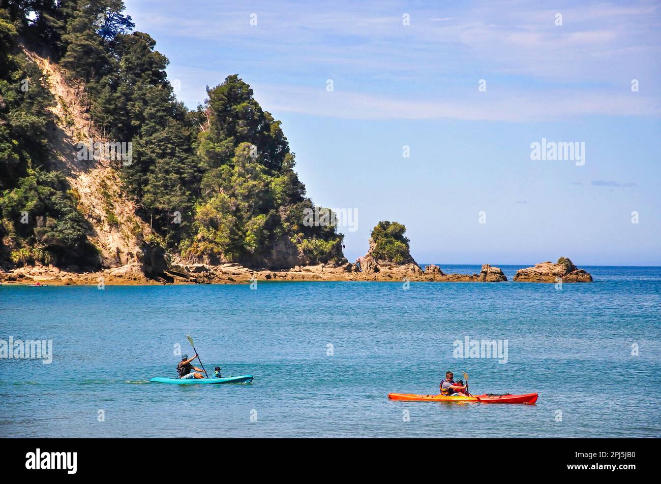 Families kayaking at Totaranui Beach, Abel Tasman National Park, Nelson ...