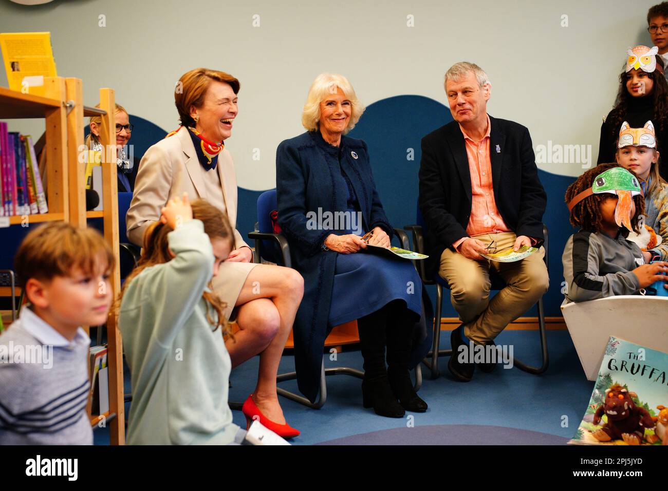 The Queen Consort reading The Gruffalo with Axel Scheffler (right), the ...