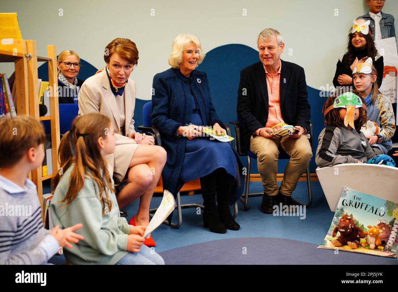 The Queen Consort reading The Gruffalo with Axel Scheffler (right), the ...
