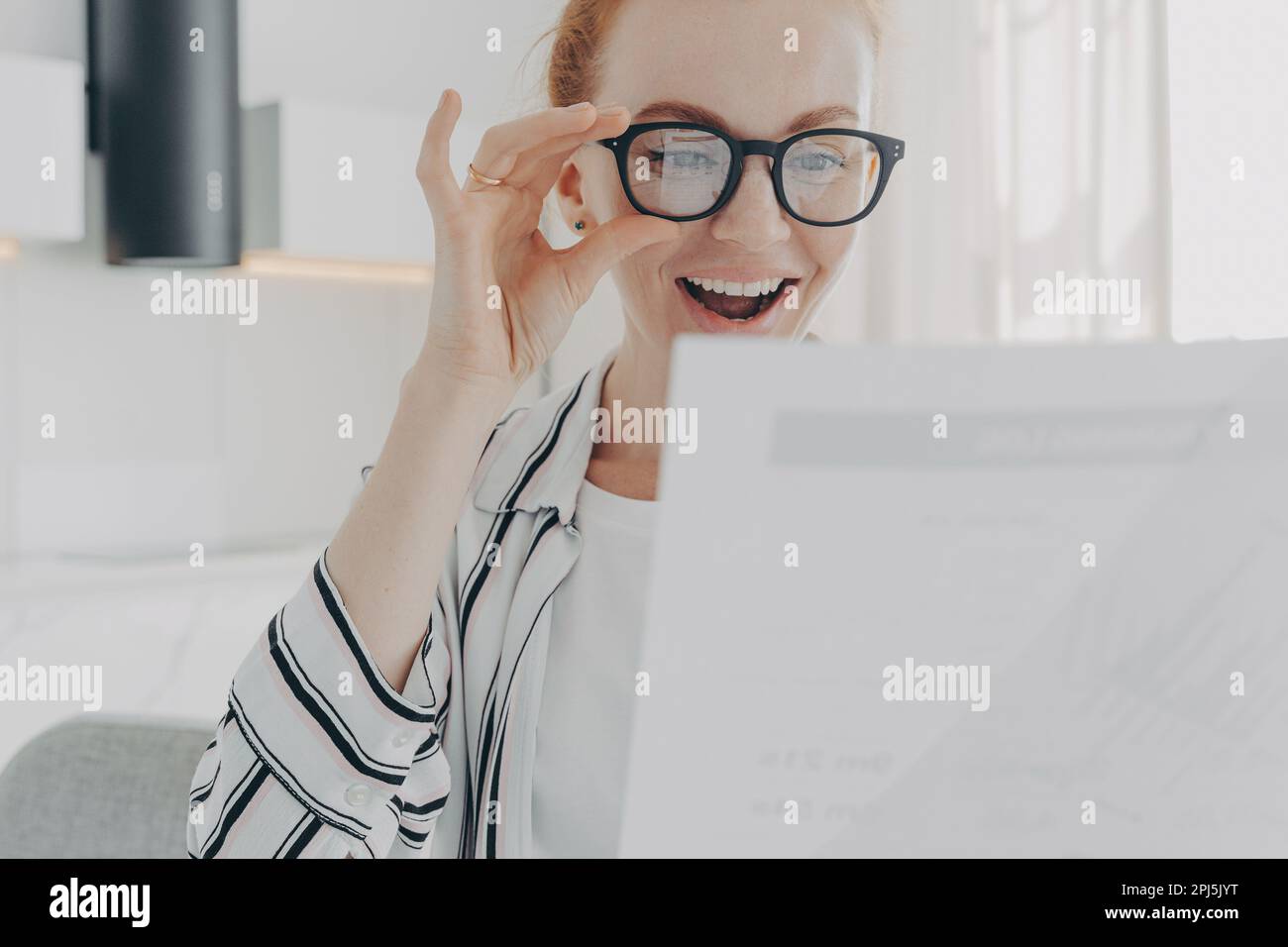 Female employee works report papers hi-res stock photography and images ...