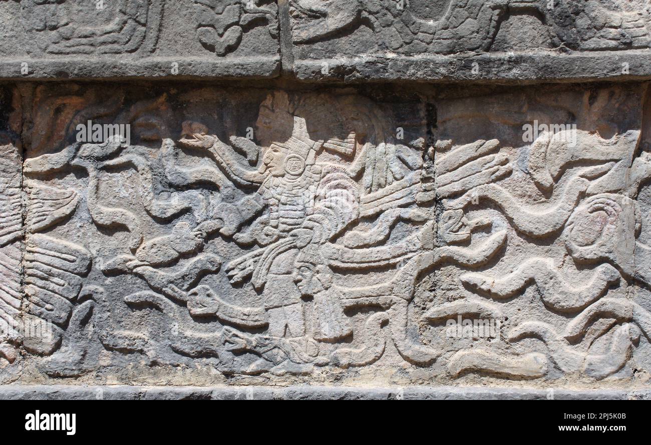 Bas-relief carving with indian warrior and serpents, pre-Columbian Maya ...