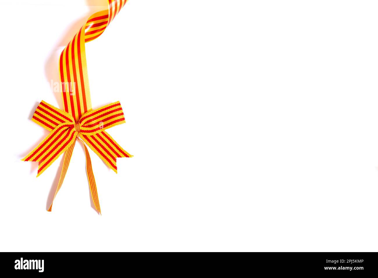 Catalan flag ribbon finished in a Catalan flag ribbon on a white ...