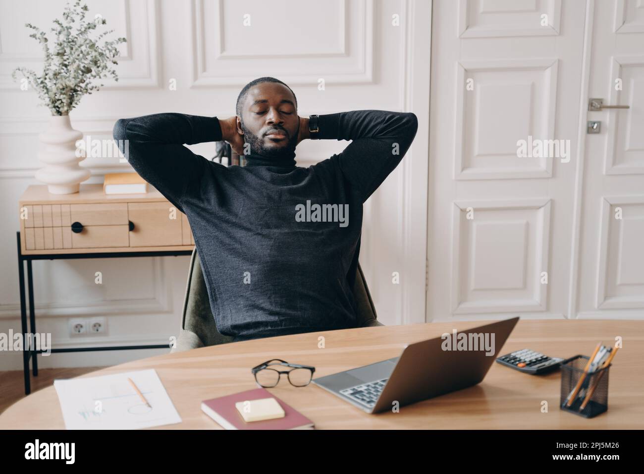Tired overworked african american male office worker with eyes closed ...