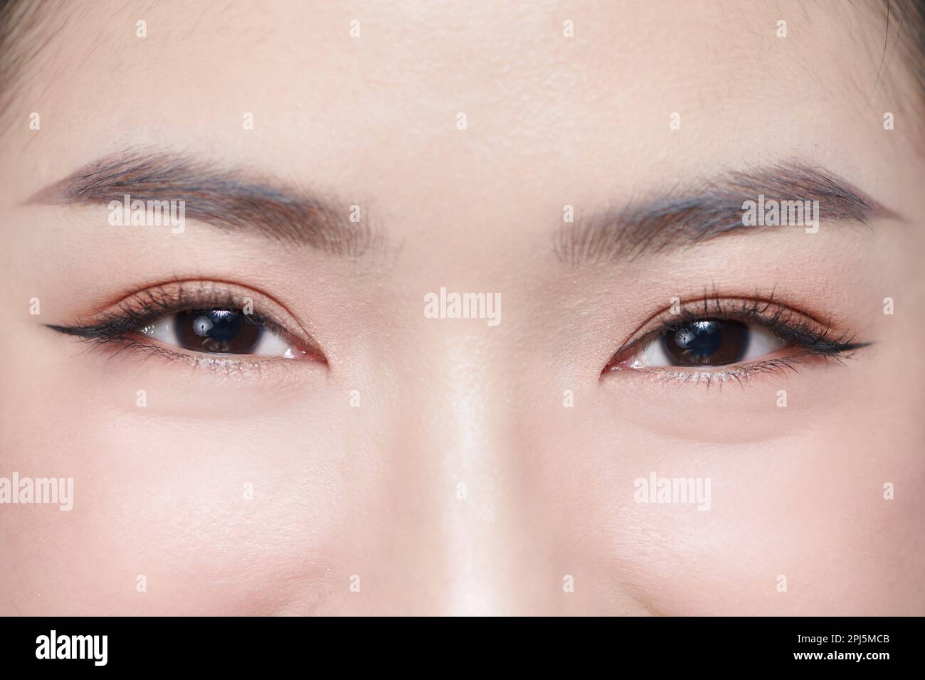 A half of a beautiful female's face with eye bags Stock Photo - Alamy