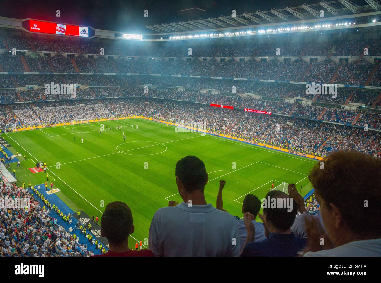 Spectators in a football match. Santiago Bernabeu stadium, Madrid ...