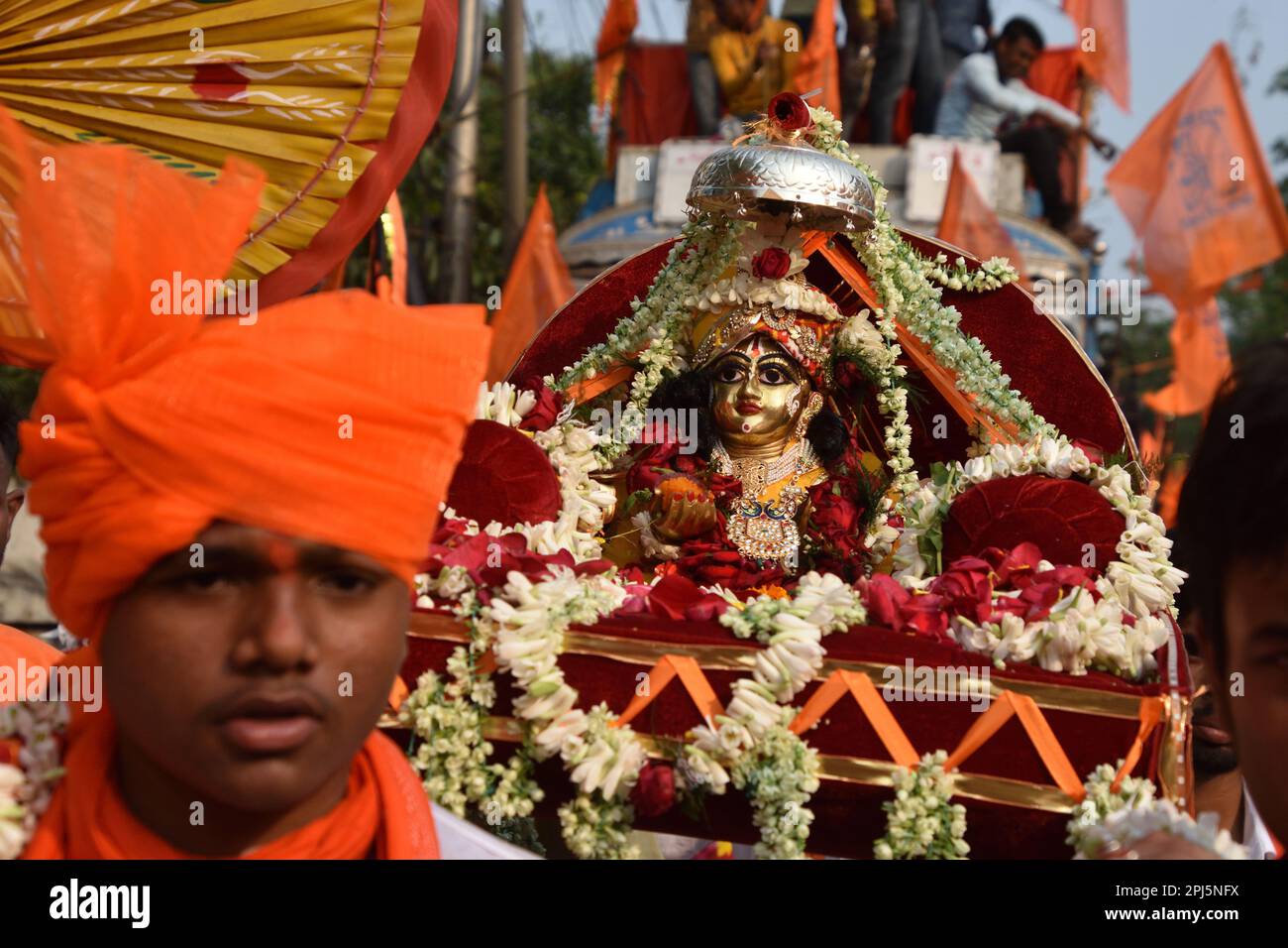 Hindu devotees hold the idol of Lord Ram while take part during Ram ...