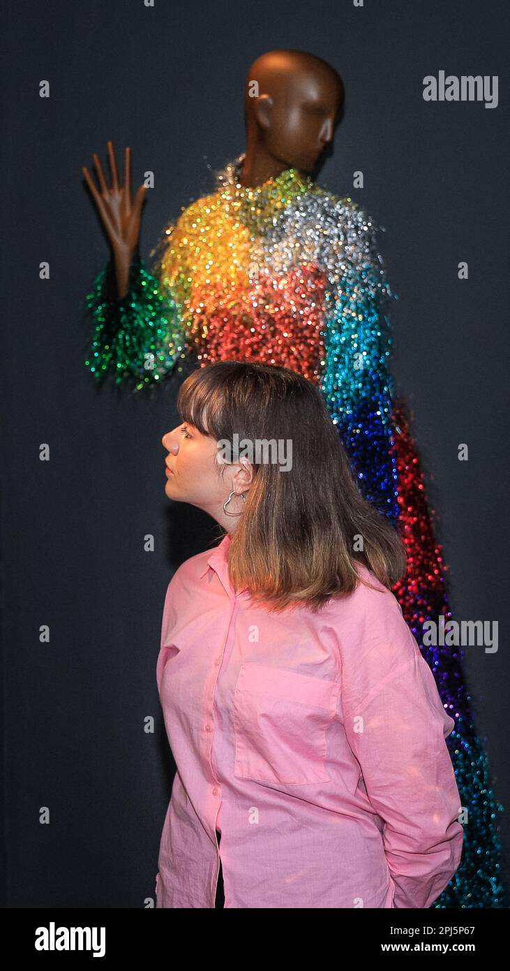 London, UK. 31st Mar, 2023. Gallery staff with the "Rainbow ombre ...