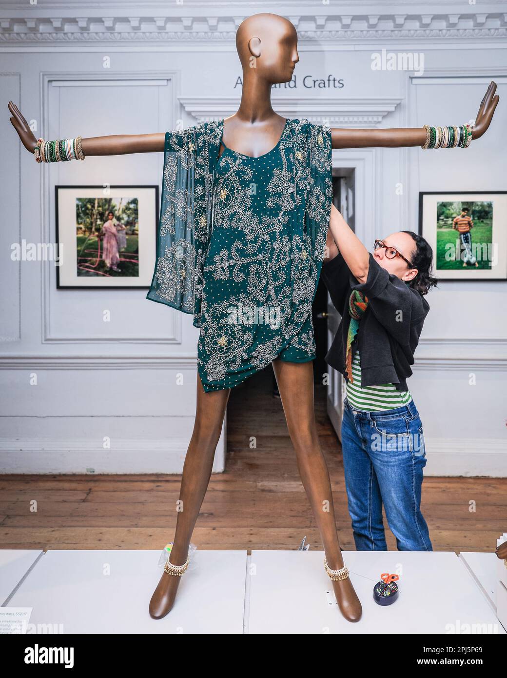 London, UK. 31st Mar, 2023. Gallery staff make adjustments to "The ...