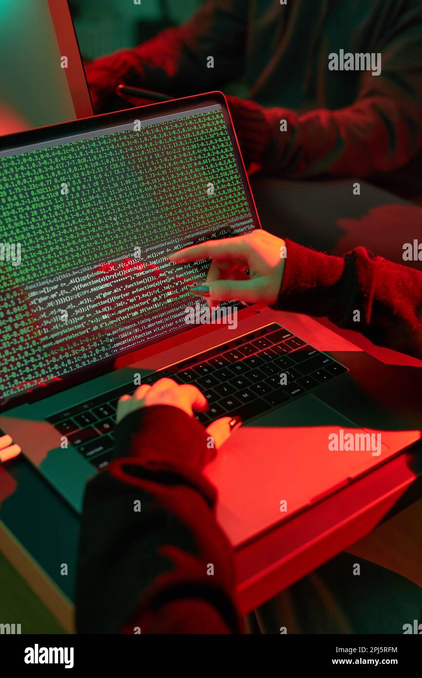 Anonymous People Using Computer And Programming To Break Code Cyber