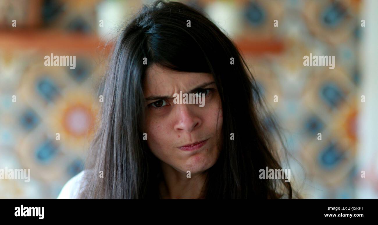 Upset woman reaction, 30 year old portrait of angry person staring at ...