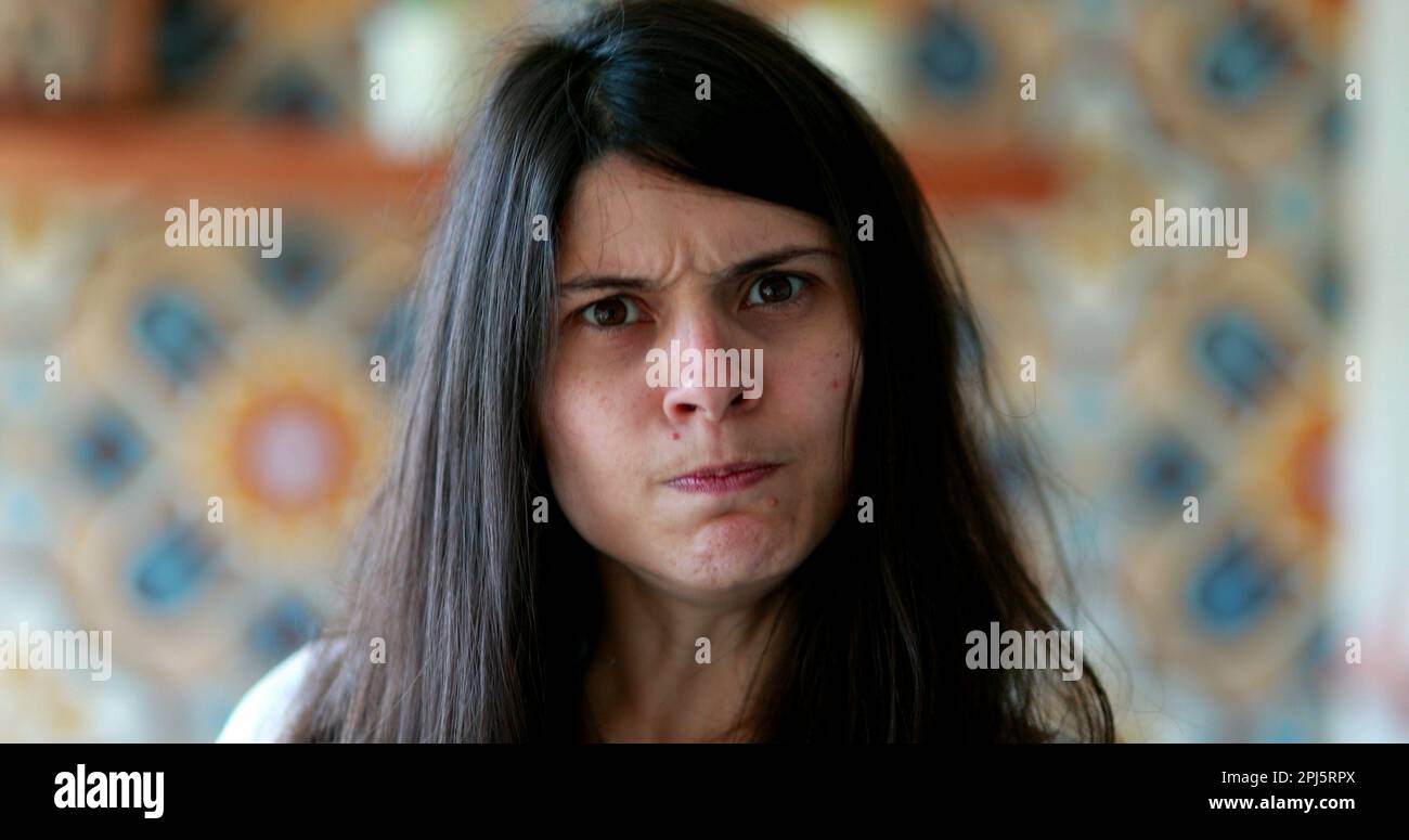 Upset woman reaction, 30 year old portrait of angry person staring at ...