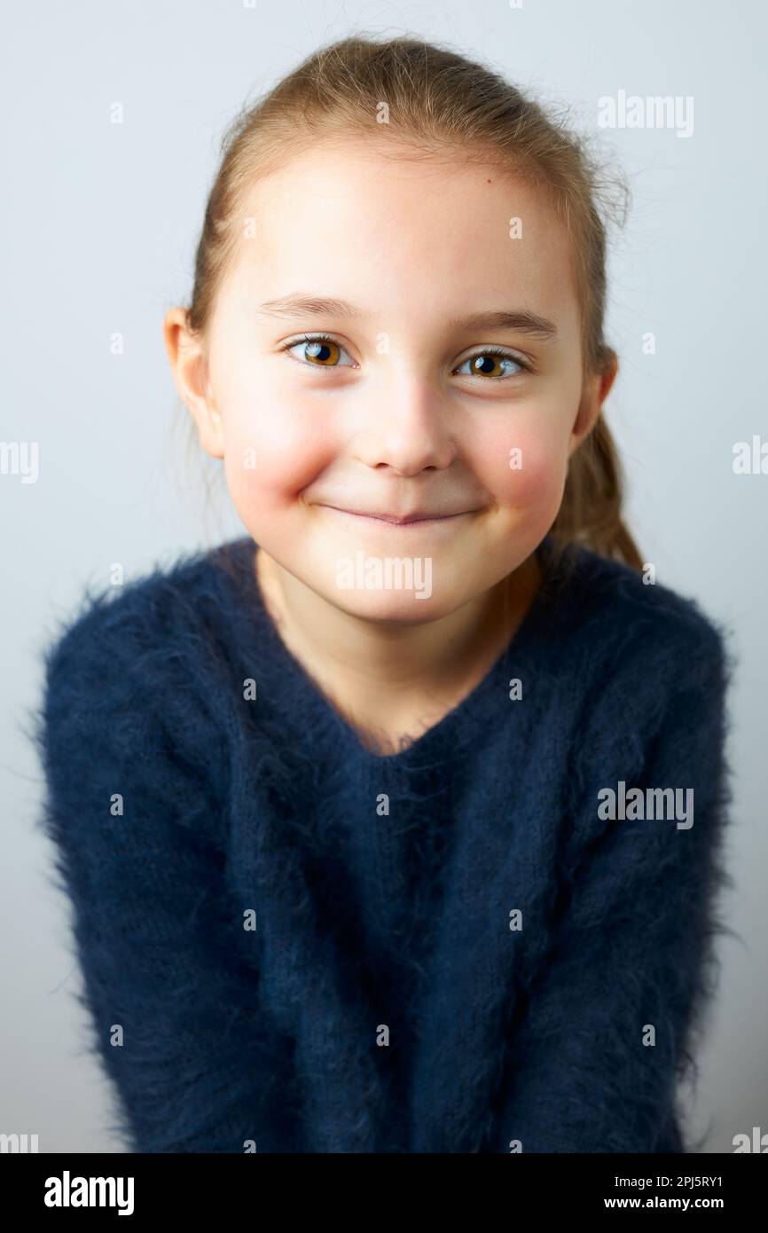 Portrait of adorable little girl. Cute small child looking at camera ...