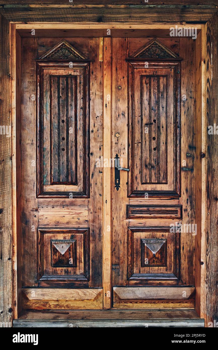 Old rustic wooden door. Entrance to house. Wooden background Stock ...