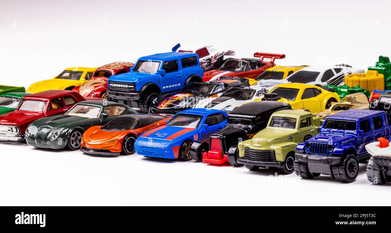 A large collection of Hot Wheels cars isolated on a white background ...