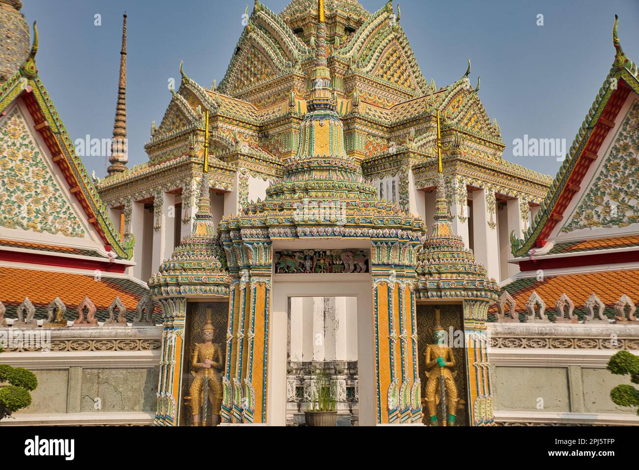 The gracefully detailed temple complex at Wat Pho temple in Bangok ...