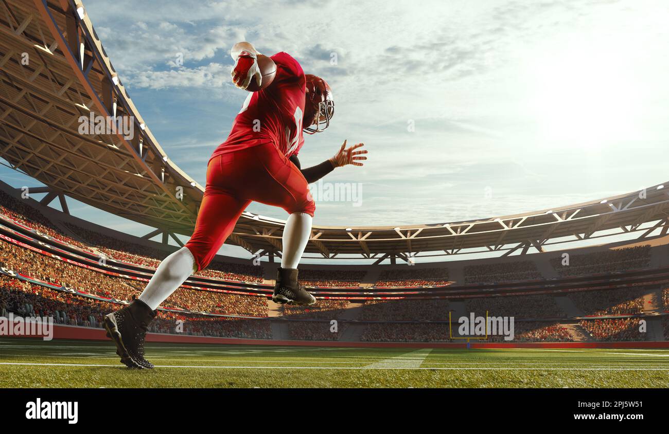 Dynamic image of male american football player in sports equipment at ...