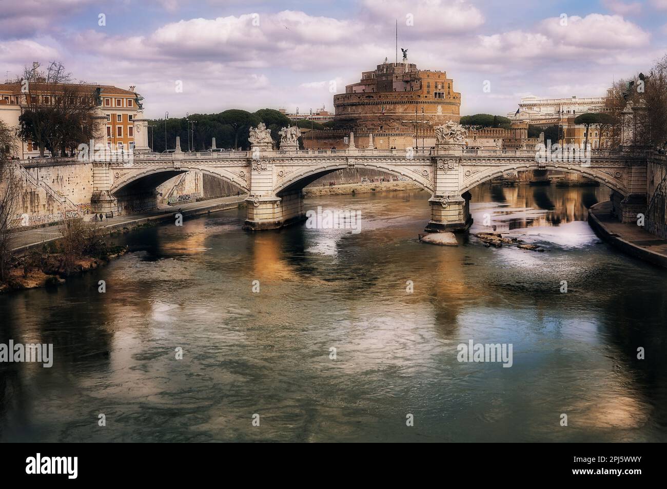 Saint Angelo castle in Rome with the Tiber river and a bridge crossing ...
