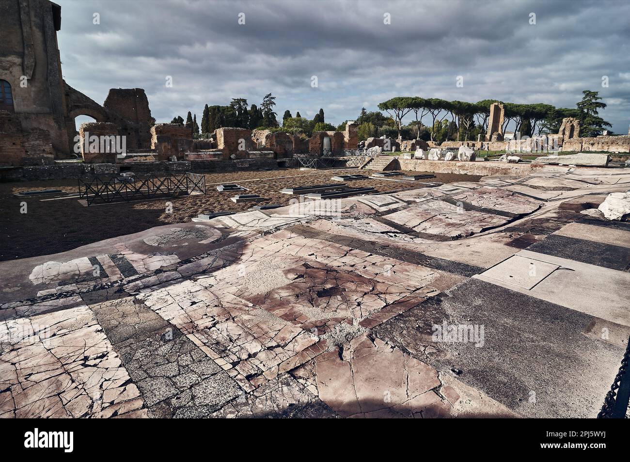 ruins and mosaics on the Palatino hill in Rome, Italy with columns and ...