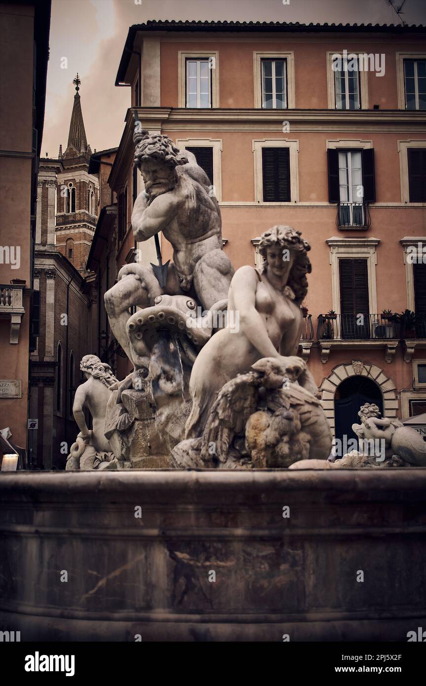 details of the sculptures on the fountains of the Navona square in Rome ...