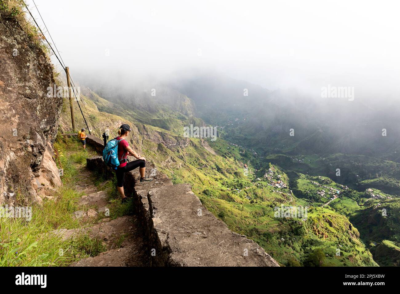 Woman hiker on a spectacular hiking trail from Cova caldera to Paul ...