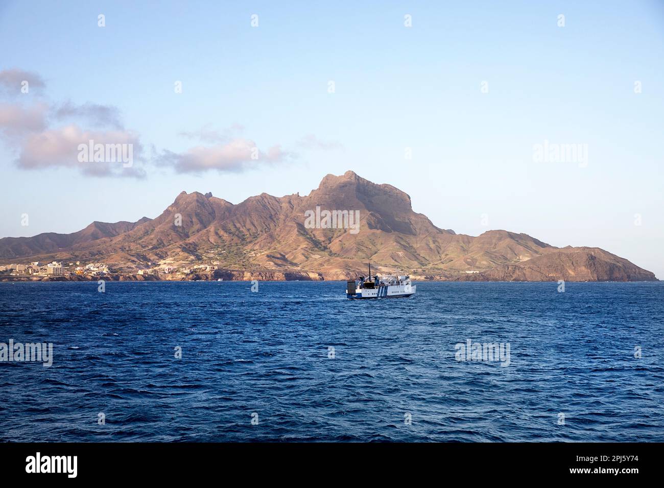 Ferry leaving mindelo harbour in beautiful morning light, with ...