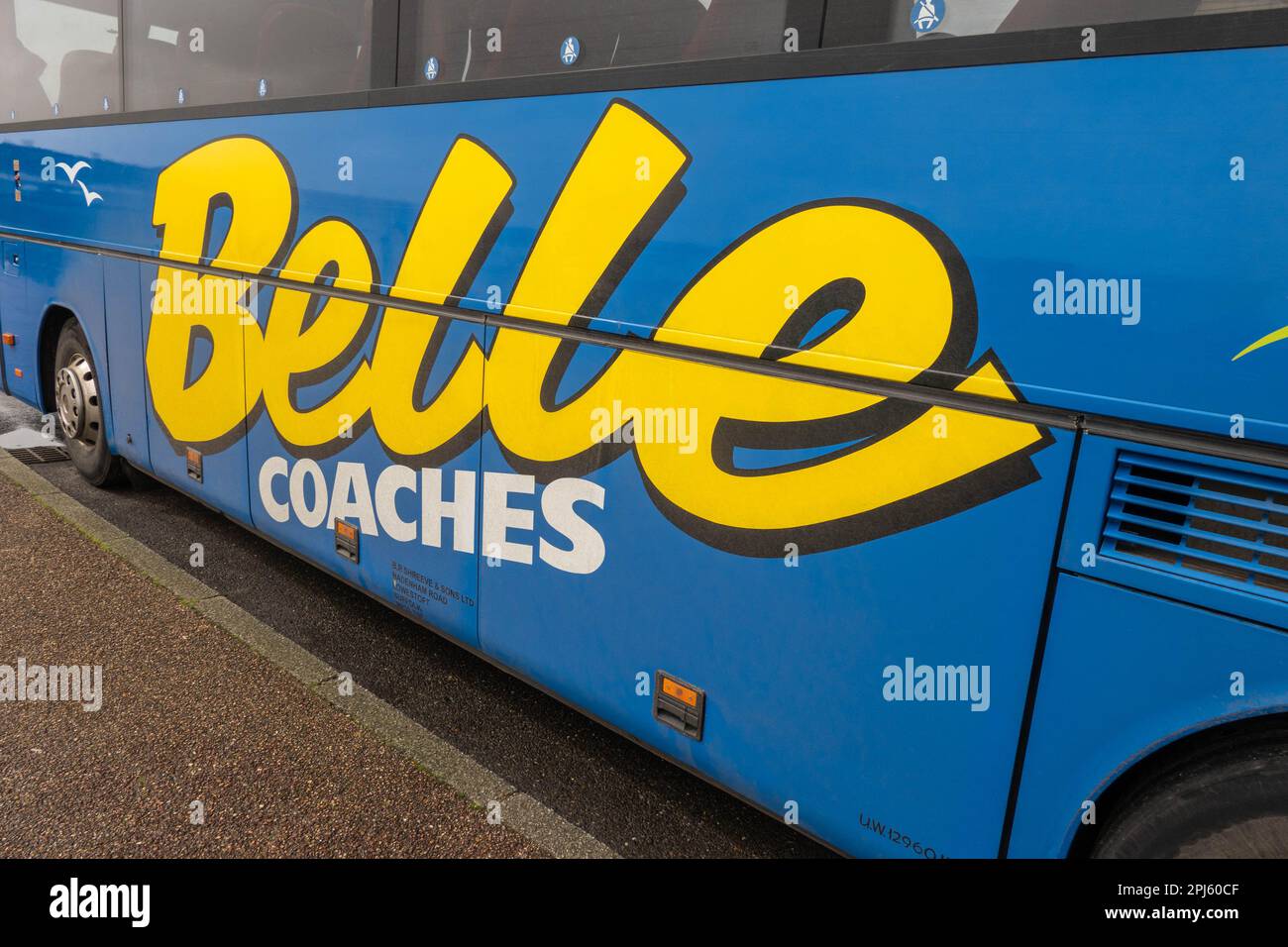 Belle coaches sign on the side of a single decker blue coach Stock ...