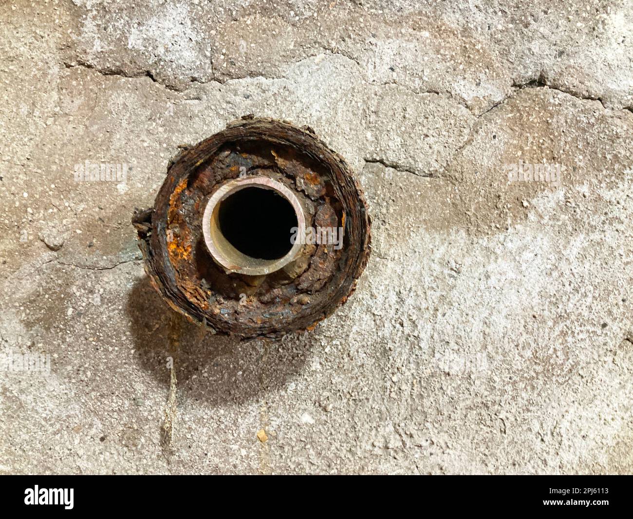 Texture concrete wall with damage metal Stock Photo - Alamy