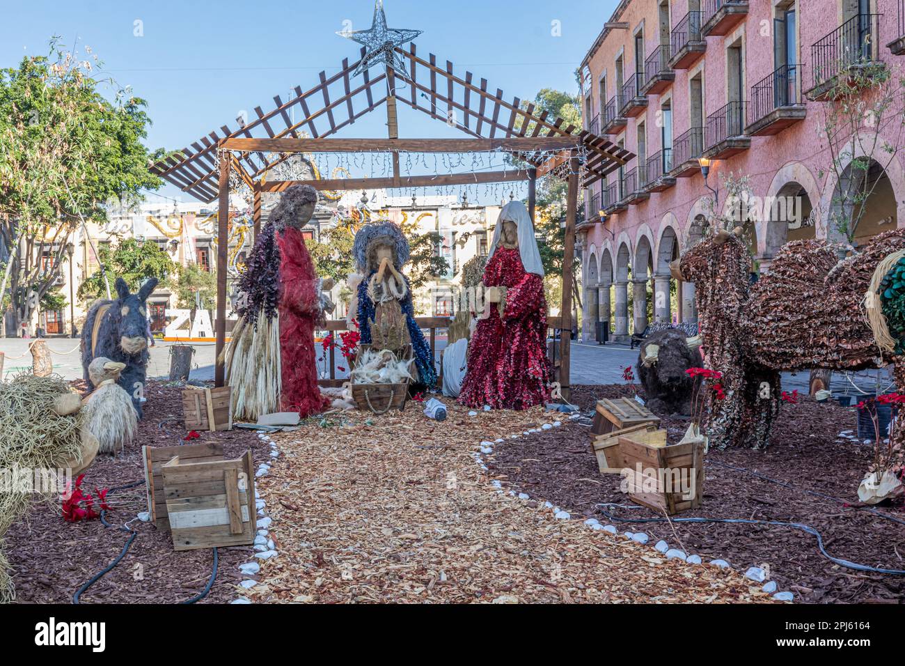 Public square with Christmas representation of nativity scene against ...
