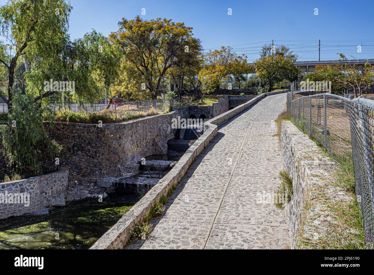 Open stone canal that carries waters of street to flow into old ...