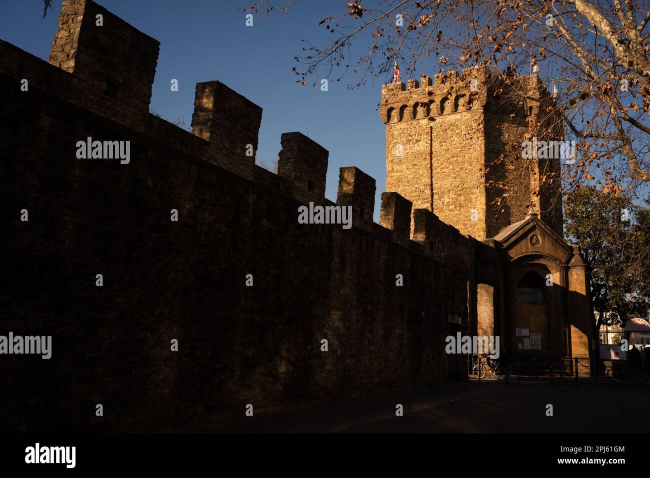 City walls and opening near Torrino di Santa Rosa, beside the river ...