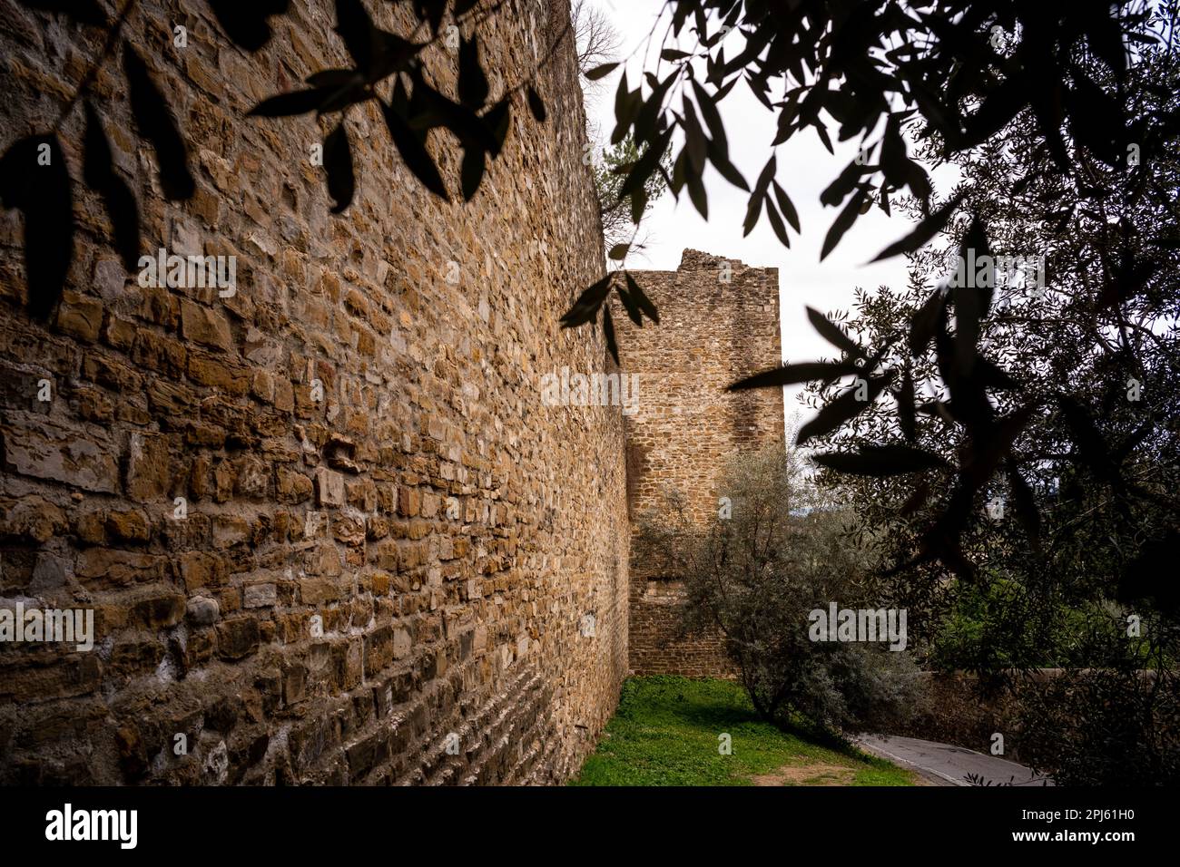 Surviving ancient city walls of Florence on Via di Belvedere around the ...