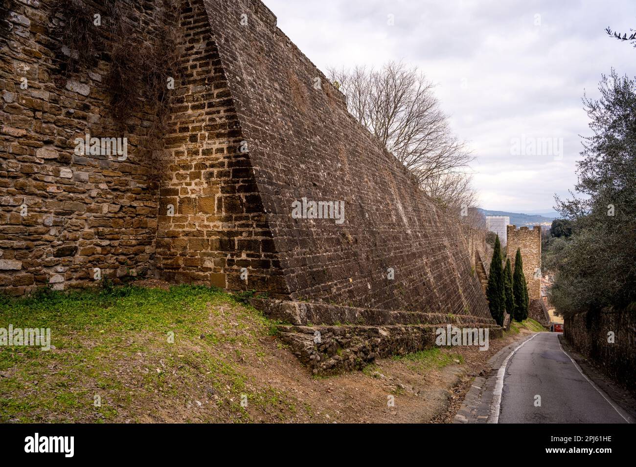 Surviving ancient city walls of Florence on Via di Belvedere around the ...