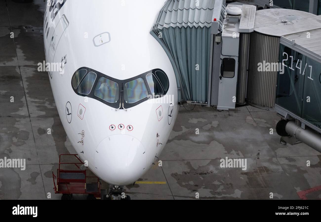 Munich, Germany. 31st Mar, 2023. A Lufthansa Airbus A350 stands at a ...