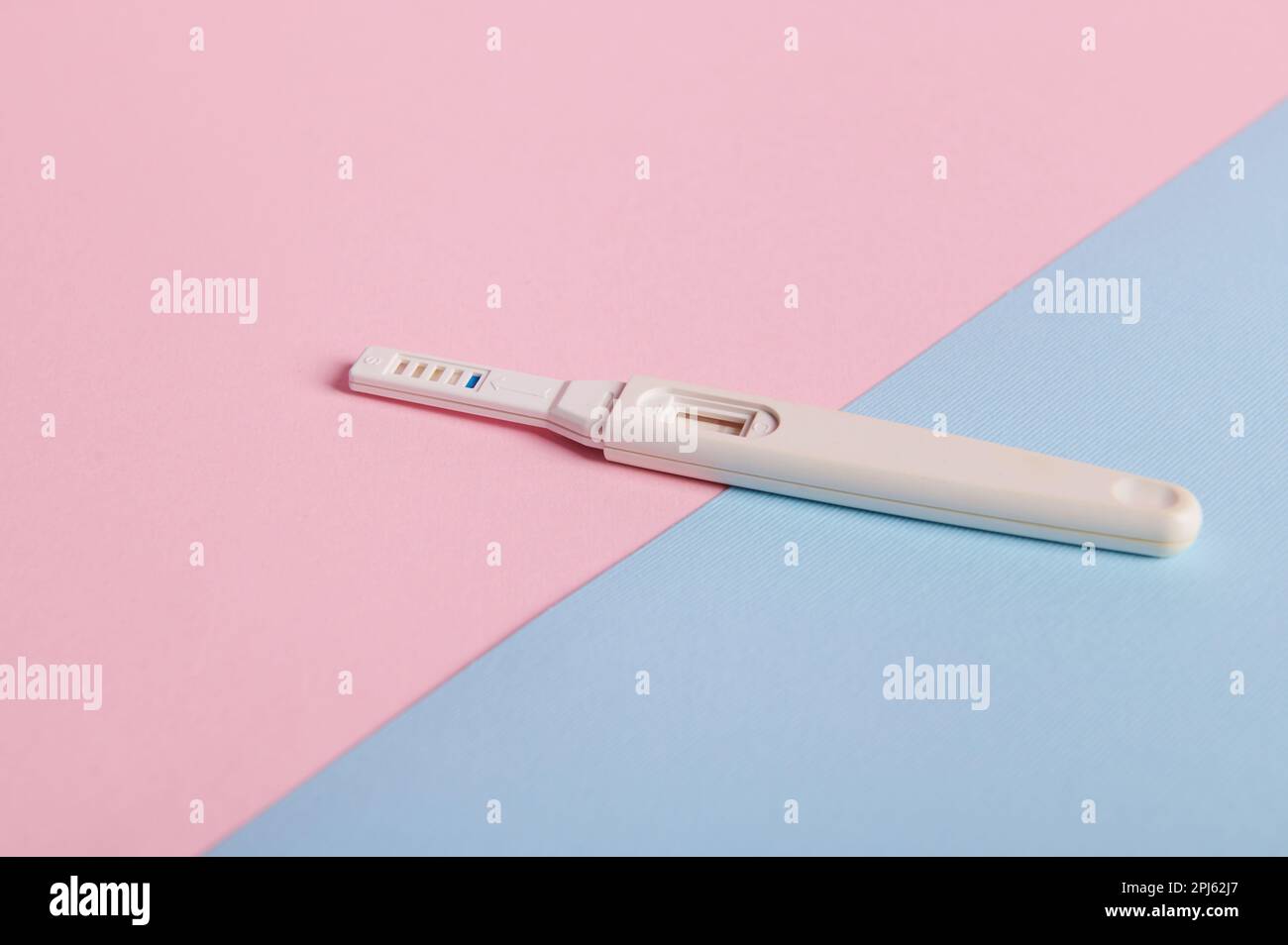 Still life. Inkjet pregnancy test with positive result, isolated on ...
