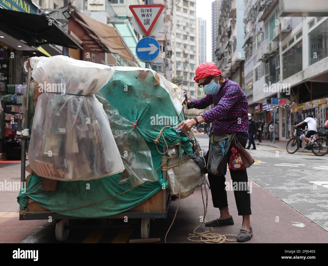 Au Yuk-hoo, 81, sells socks and stockings in Causeway Bay. 15MAR23 SCMP ...