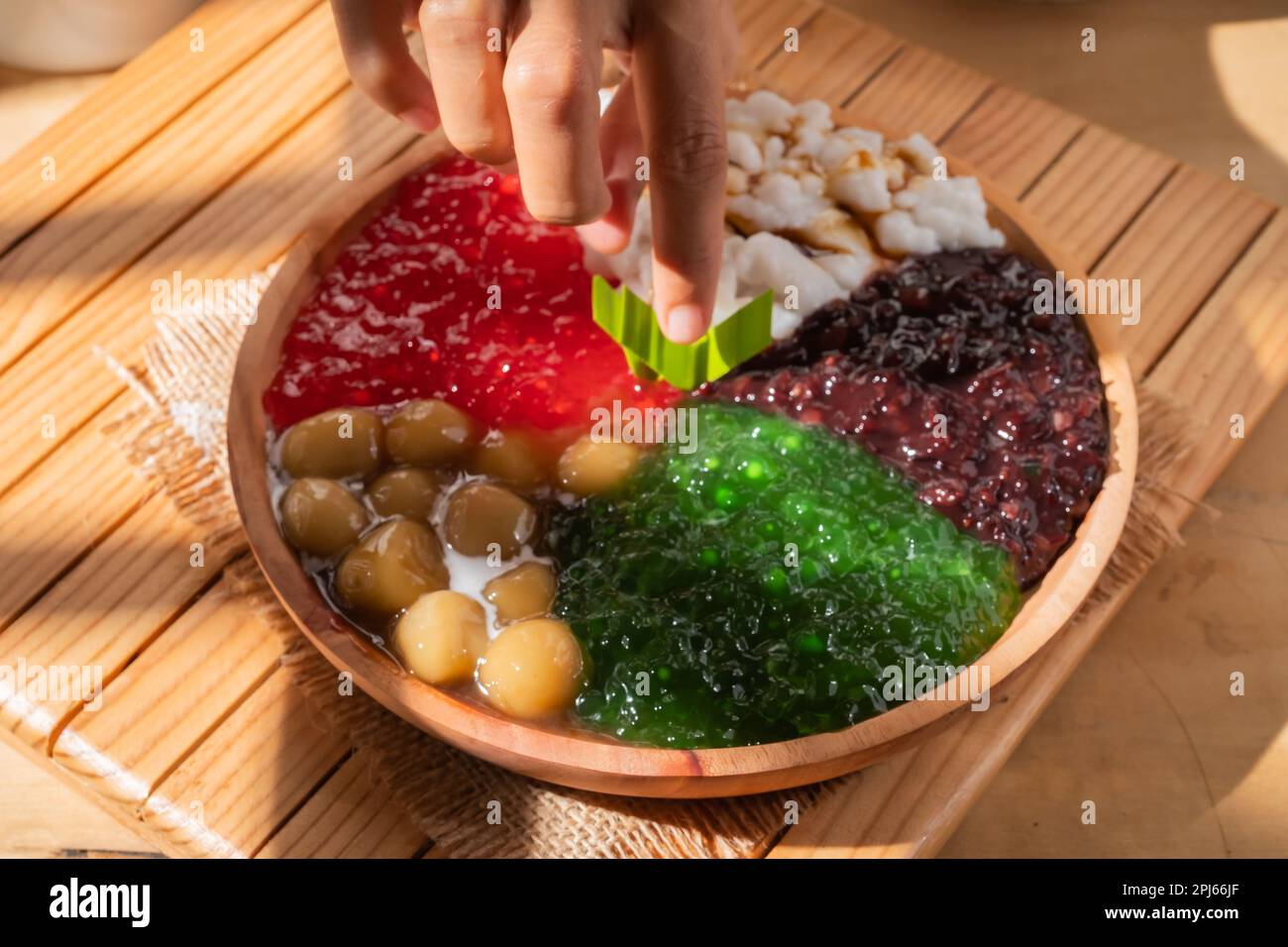 Pearl porridge or pearl sago. Popular Indonesian desserts served on ...