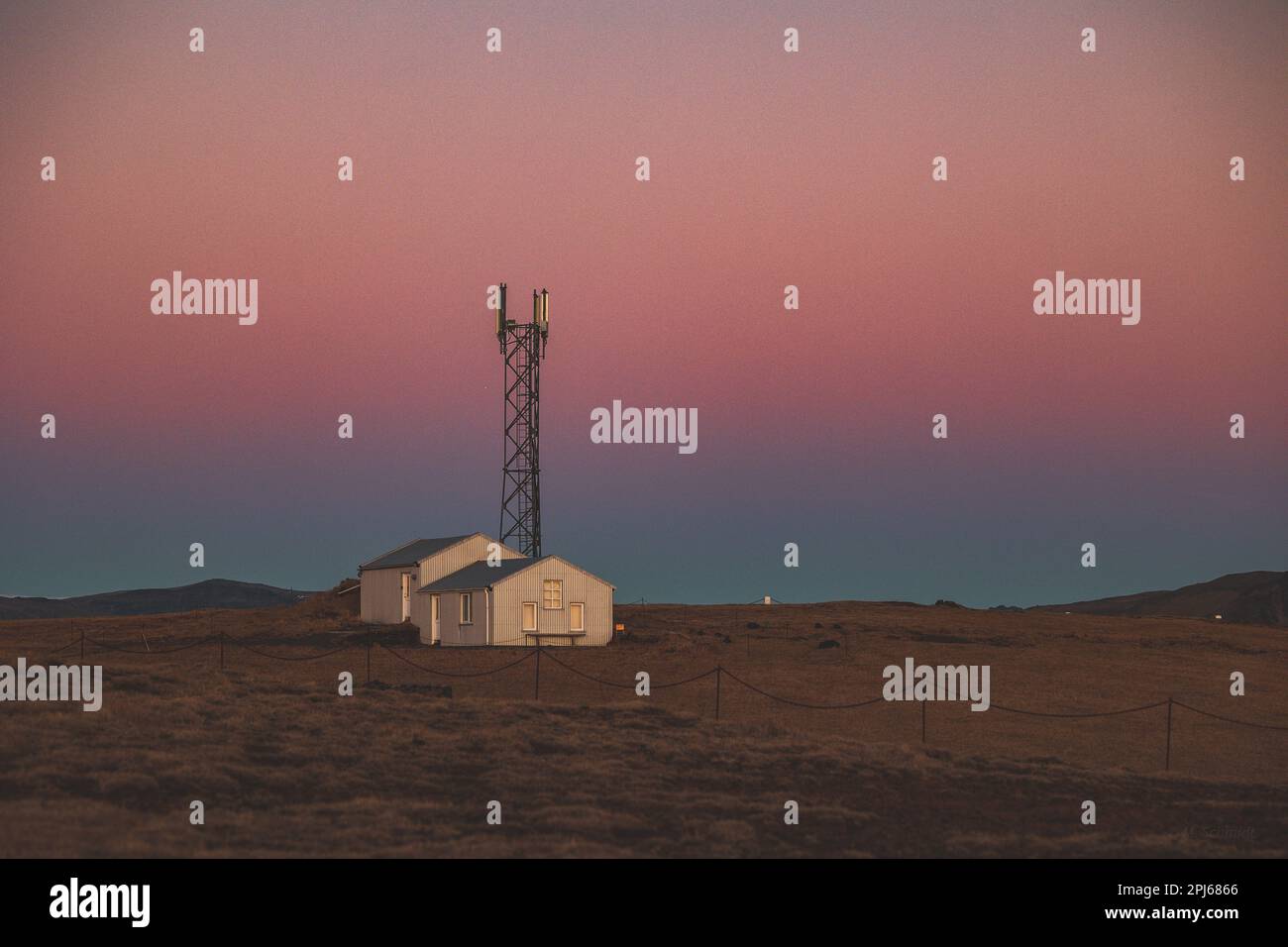 A majestic white building stands in the middle of a vast, empty plain ...