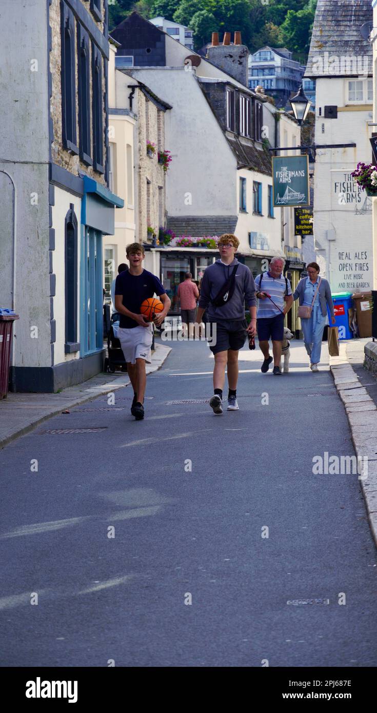 Looe, Cornwall, England, 06 July 2022: restaurants, pubs and shops ...