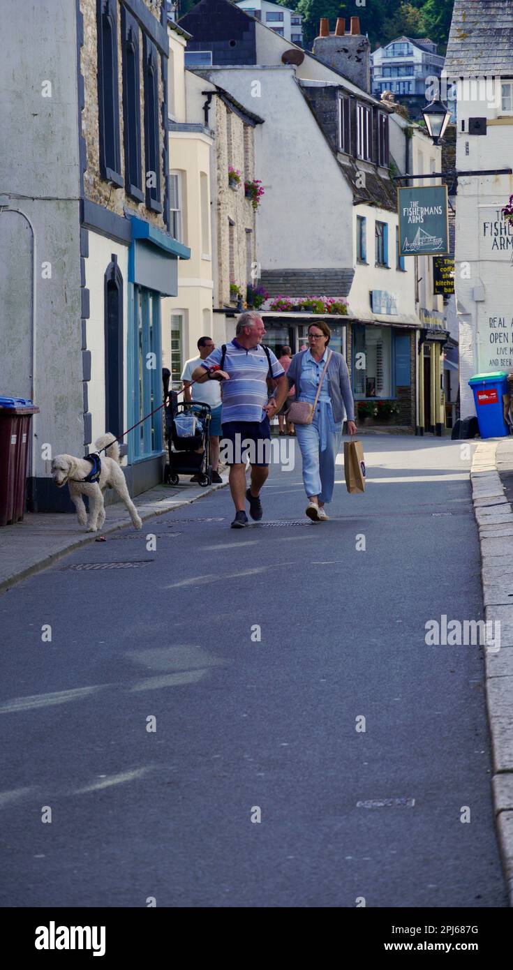 Looe, Cornwall, England, 06 July 2022: restaurants, pubs and shops ...