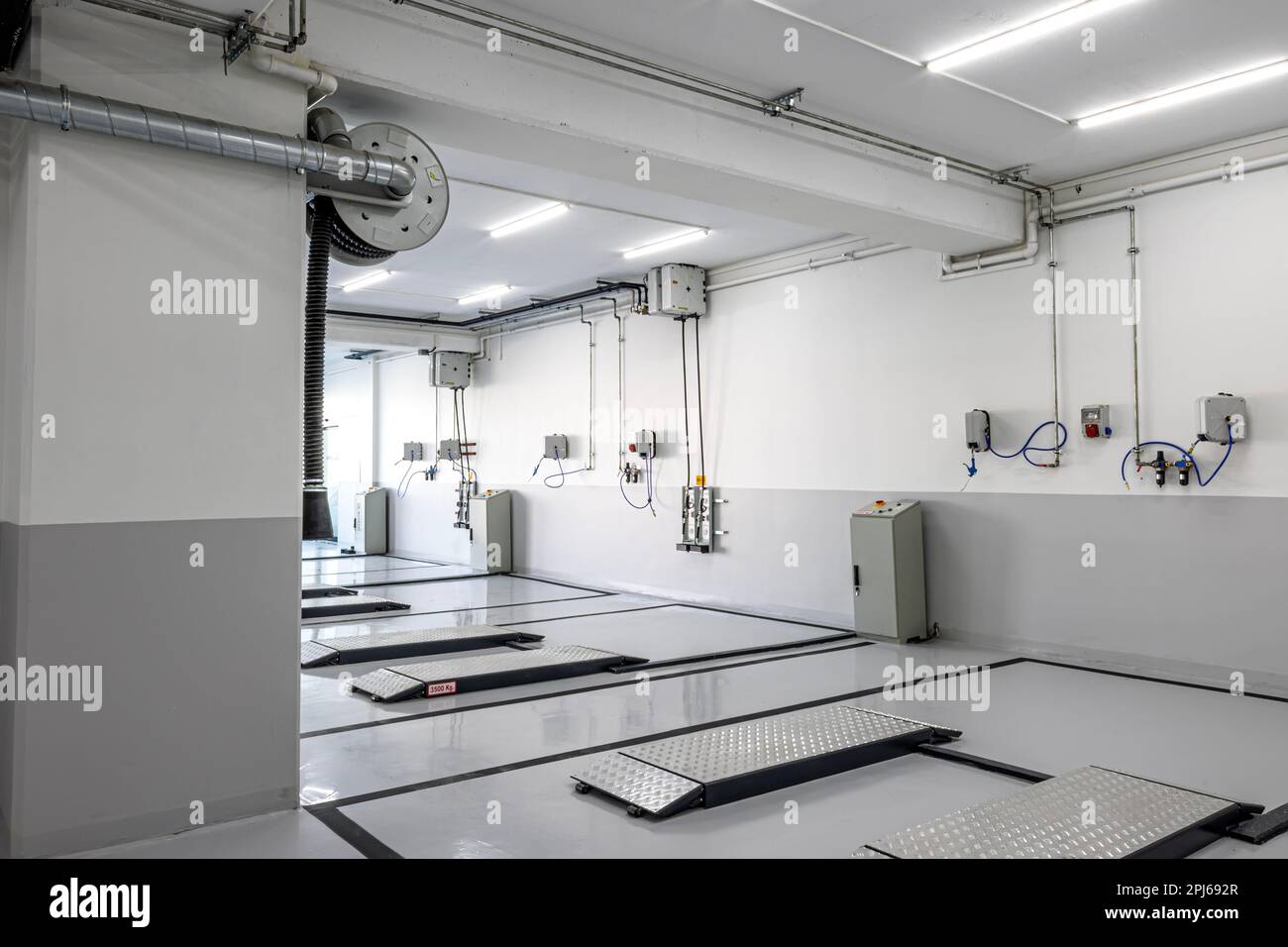 New car repair center. Empty car repair center. Interior of empty car ...