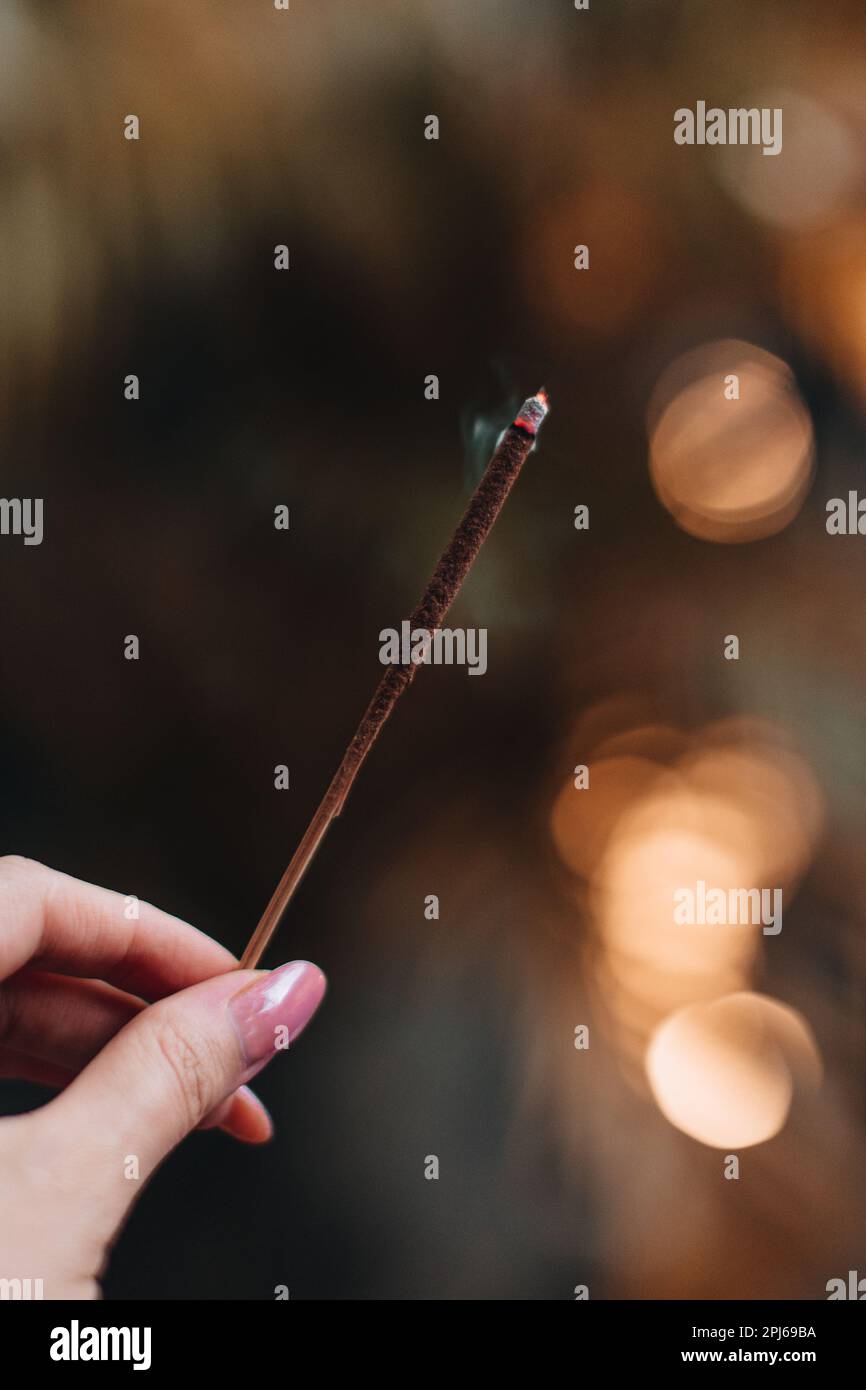 Incense burning hand hi-res stock photography and images - Alamy