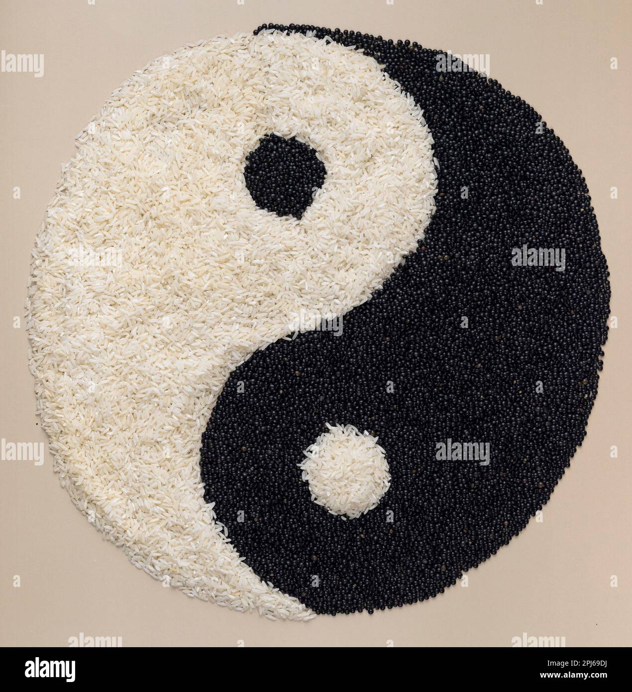 Yin yang of rice and black lentils, healthy food, feng shui, white ...