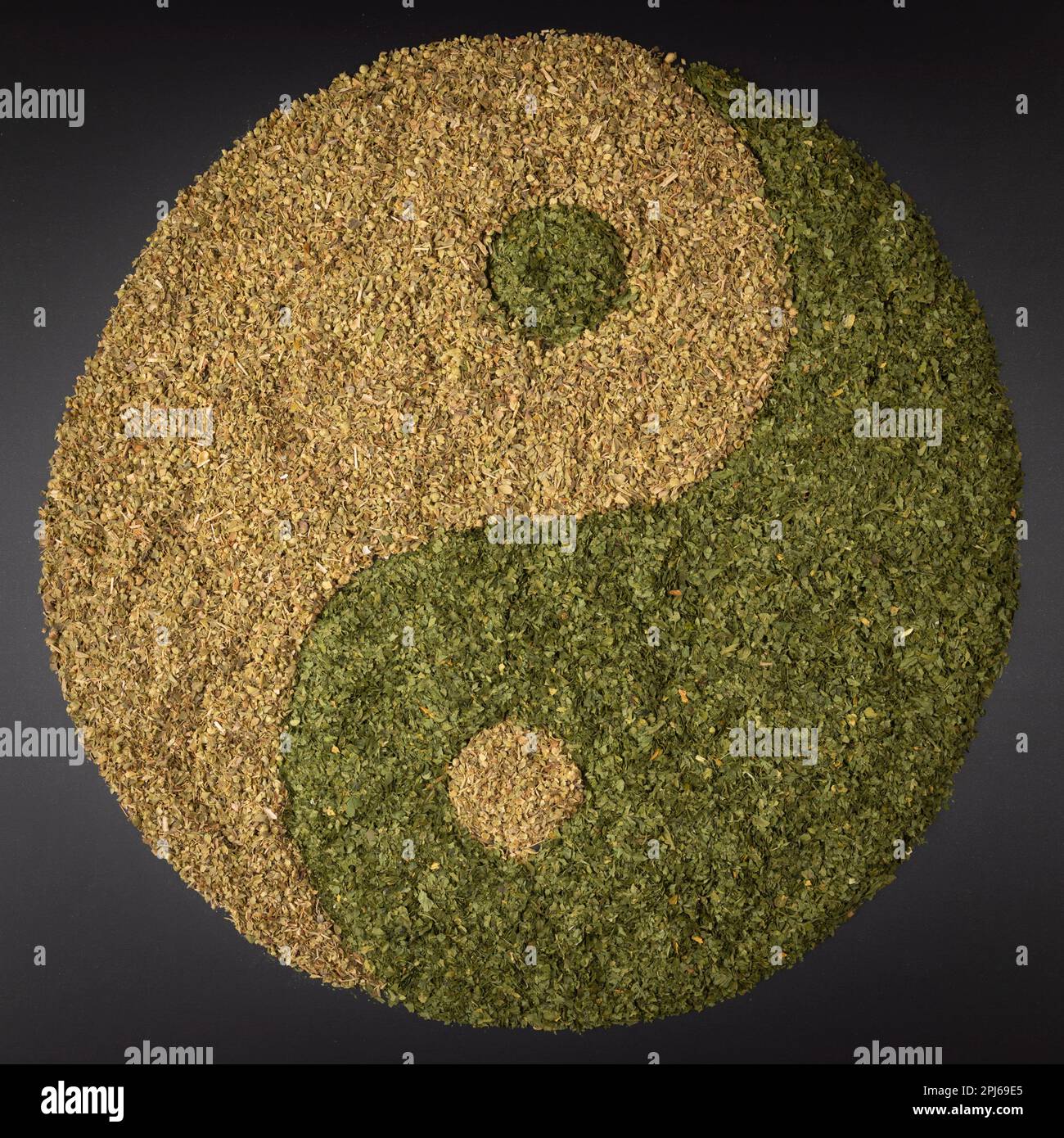 Yin Yang from dried oregano and dried parsley, healthy food, feng shui ...