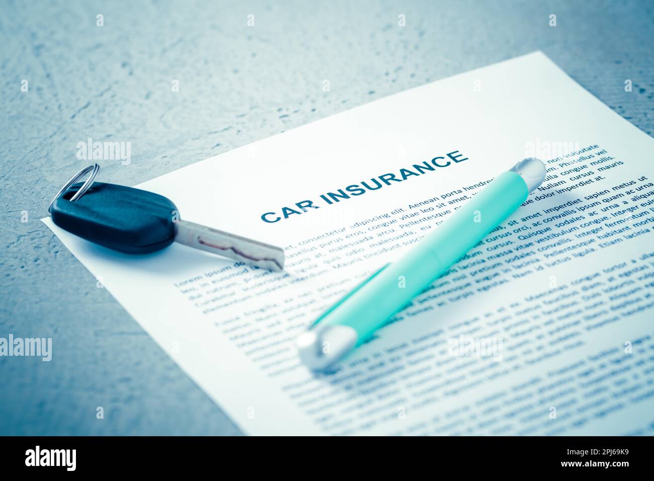Concept of car insurance - car policy with car keys on blue tone Stock ...