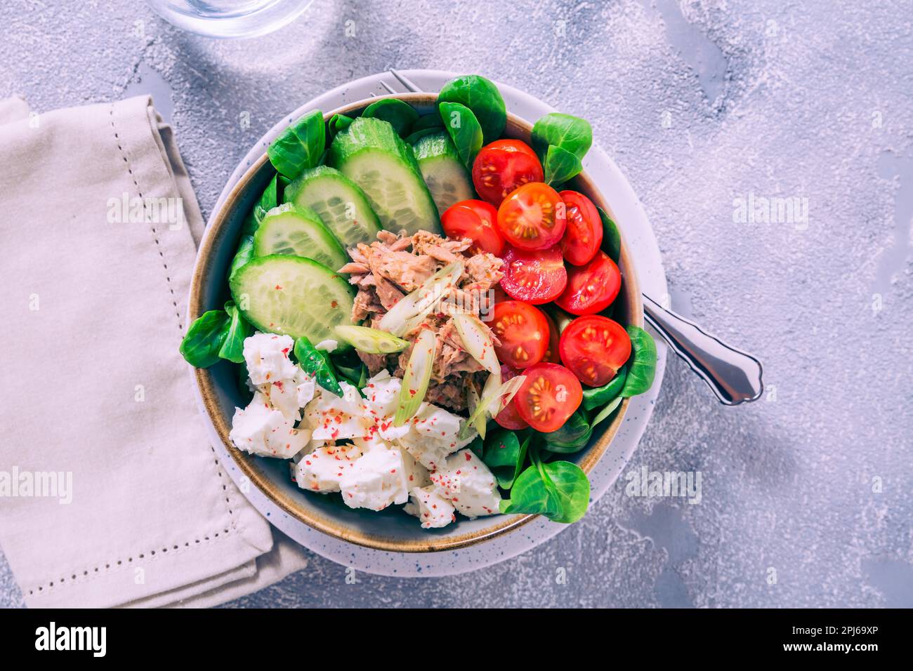 Vegetarian buddha bowl. Raw vegetables and tuna in a one bowl ...