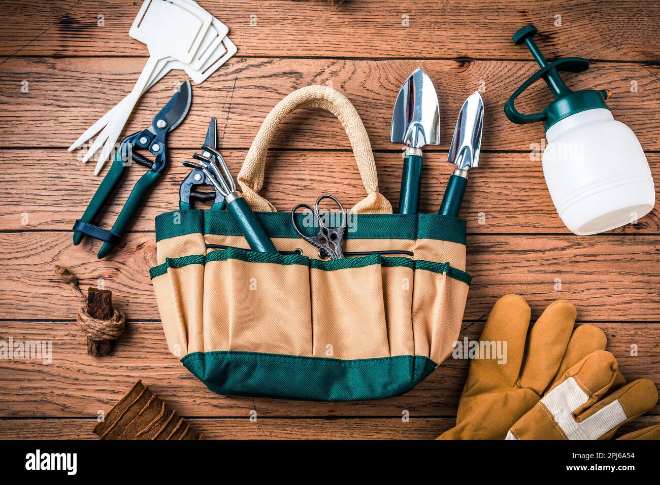 Gardening tools and equipment on wooden background Stock Photo - Alamy