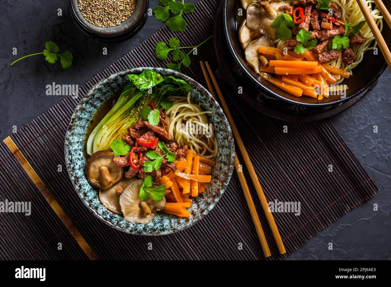 Asia style ramen soup with udon noodle, beef, shiitake, pak choi ...