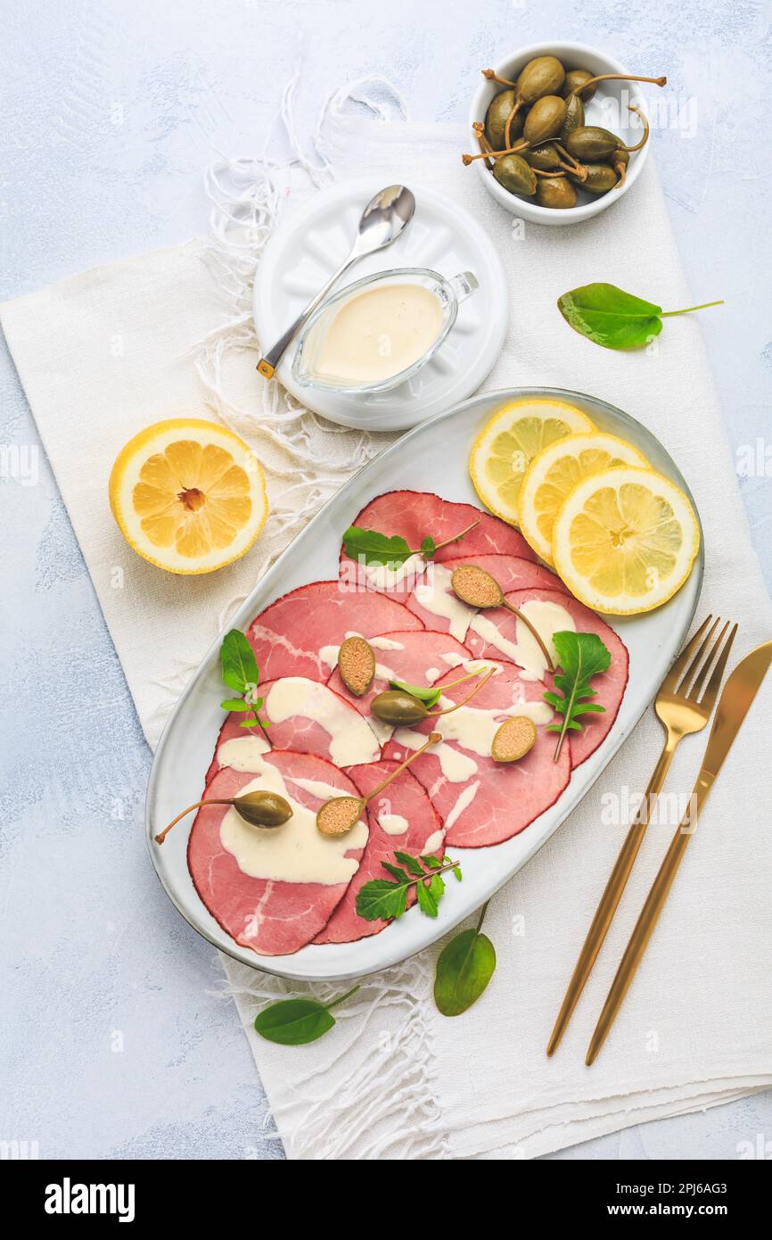 Vitello tonnato - Italian cuisine, sliced veal with tuna sauce as ...